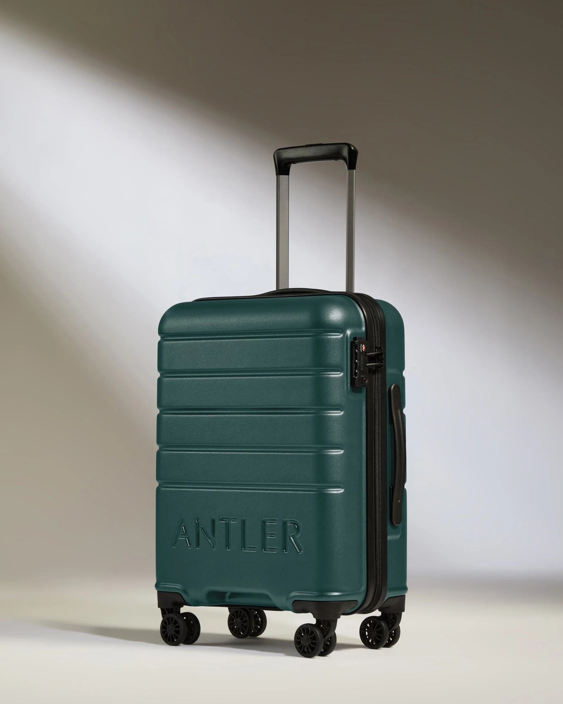 Cabin Suitcase in Dark Teal - Logo - Borderfree